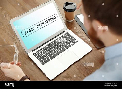 Man Using Modern Laptop At Table Closeup Bootstrap Button Stock Photo Alamy