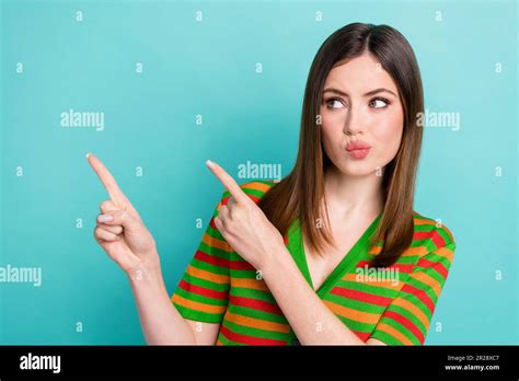 Photo Of Doubtful Unsure Woman Dressed Striped Looking Pointing Two