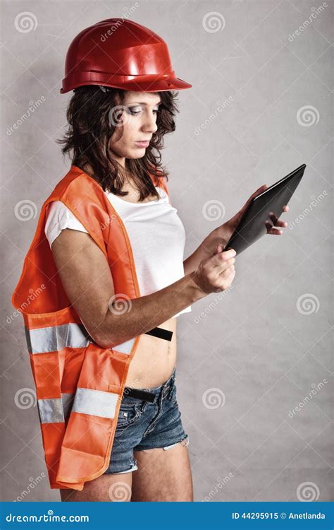 Girl In Safety Helmet Using Tablet Touchpad Stock Image Image Of Contractor Girl 44295915