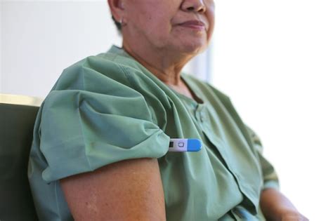 Premium Photo Body Temperature Check With Digital Thermometer