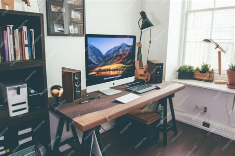 Premium Photo A Computer Desk Features A Keyboard And A Monitor Creating A Functional