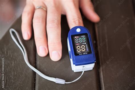 Using Oximeter For Monitoring Peripheral Oxygen Saturation Close Up