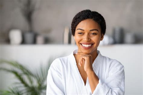 Premium Photo Portrait Of Beautiful Black Woman In White Bathrobe