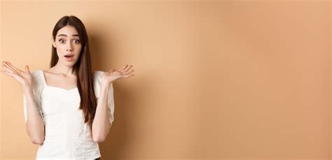Free Photo Surprised Caucasian Girl Look With Disbelief And Amazement