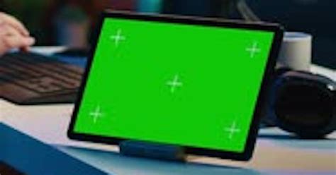 Vertical Video Developer Using Green Screen Tablet Updating Artificial