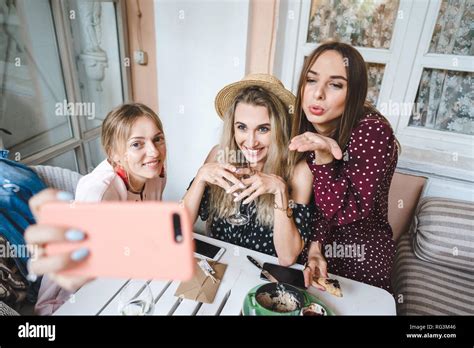 Three Girls At The Table Stock Photo Alamy