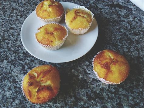 Premium Photo High Angle View Of Muffins In Plate On Table