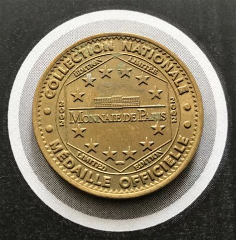 MONNAIE DE PARIS Medaille Jeton Touristique Evm Mdp Logo Vulcania 2002