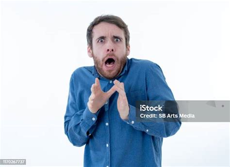 Human Emotions And Facial Expression Portrait Of Young Man In Shock