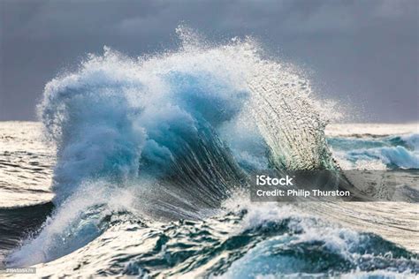 Colliding Waves Creating A Dramatic Display Of Power In Nature With