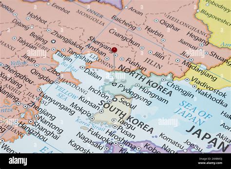 Close Up To A Pyongyang City With A Red Pin Needle Into North Korea Country Political Map Stock