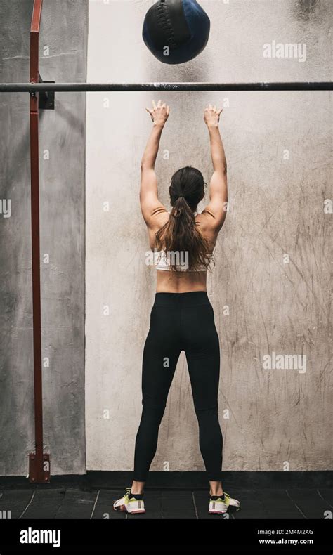 Always Pushing Her Limits Rearview Shot Of An Unrecognizable Woman