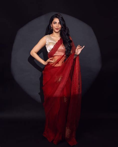 Shruti Oozes Elegance In Fiery Red Saree