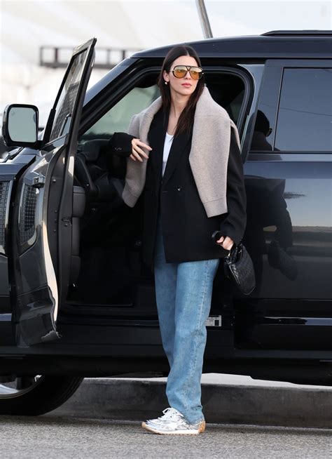 Kendall Jenner In Bottega Veneta And Oversized Orange Lens Glasses La Celebmafia