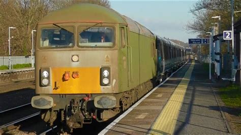 GBRf Class 69 69010 Still In Undercoat Drags SWR 701527 At Byfleet