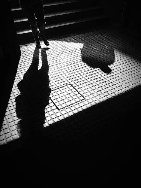 Premium Photo Shadow Of People On Floor
