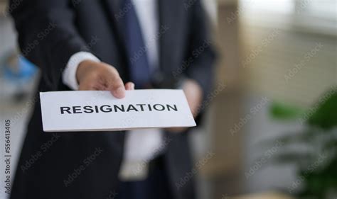 Resignation Letter And Cardboard Box On The Table Termination And Resignation Job Resignation