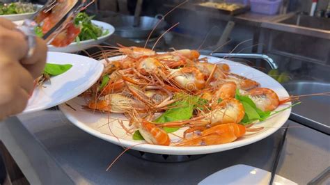 Boiled Shrimp Seafood Buffet People Picking Up Food White Plate Filled With Delicious Food From