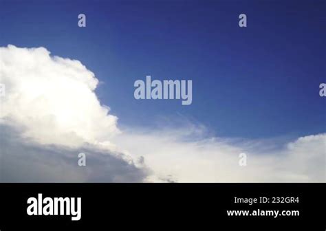 Slow Moving White Cumulus Clouds Blue Sky With Several Layers Of
