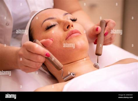 Face Rollers Applied In Madero Massage Therapy Woman Having A Madero