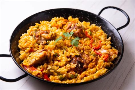 Premium Photo Baked Chicken Rice Paella With Vegetables Traditional