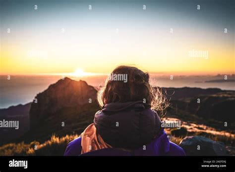 Description Sitting Woman Watching The Sunrise Over The Beautiful