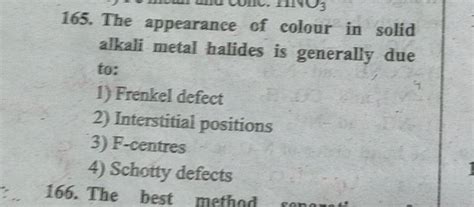 The Appearance Of Colour In Solid Alkali Metal Halides Is Generally Due T