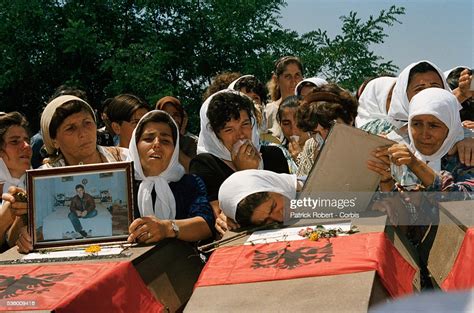 Kosovar Albanians Bury Victims Of A Massacre Which Took Place Five