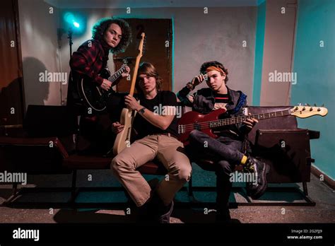 Music And Fashion Group Portrait Of Musicians Handsome Young Men