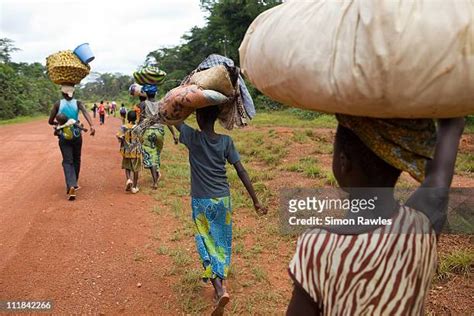 Ivorian Refugees Seek Shelter In Neighbouring Liberia Photos And