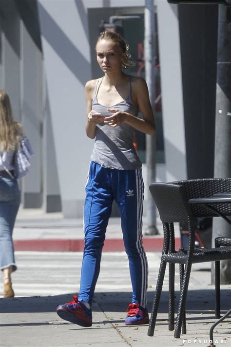 Lily Rose Depp Wearing Blue Track Pants July 2016 Popsugar Fashion