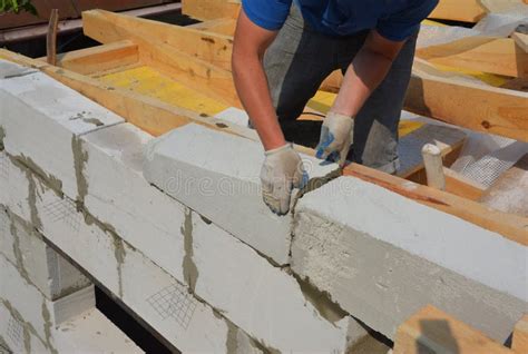 Bricklayer Builder Laying Autoclaved Aerated Concrete Blocks Aac For