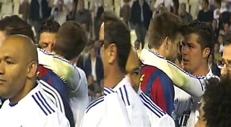 Gerard Piqué kisses Cristiano Ronaldo Cristiano Ronaldo Photo