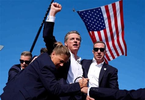 Photo Gavin Newsom Fist Pumping Like Trump Surrounded By Secret Service