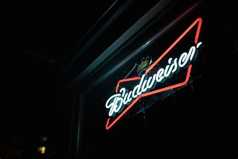 Neon Budweiser Sign At Night