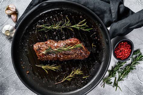 Cooked Vegas Strip Steak In A Pan Marble Meat Beef Gray Background