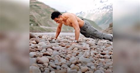 49 Year Old Sonu Sood Flaunts Six Pack Abs By Doing Pullups In A