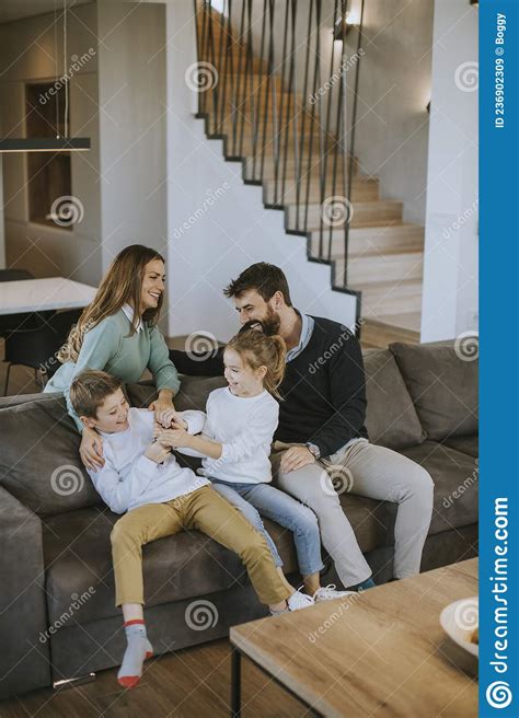 Siblings Fighting Over Tv Remote Control At Home Stock Image Image Of