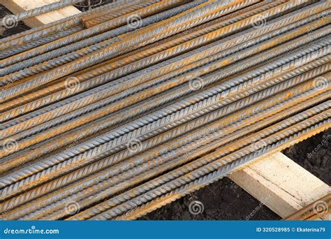 A Stack Of Rusty Rebar On A Construction Site Stock Image Image Of