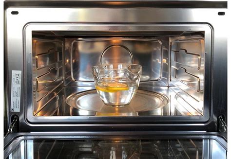 How To Clean Your Microwave With Vinegar And Lemons This Girl Can