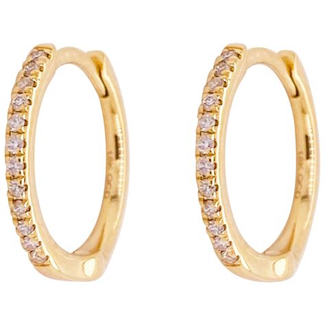 18 Karat White Gold Peak Top Huggies With 084 Carat Of Diamond Hoops