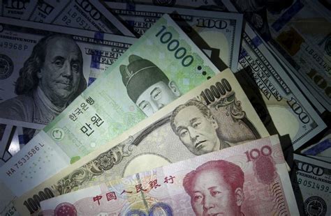 الين يرتفع وسط تكهنات باتجاه بنك اليابان لرفع الفائدة صحيفة الخليج