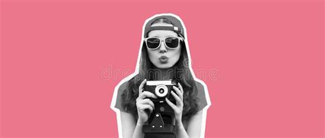 Stylish Happy Young Woman Photographer Taking Picture On Camera Blowing