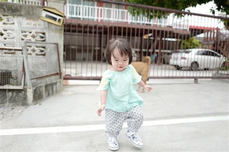 Premium Photo Cute Girl Walking On Road