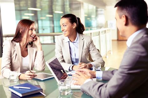 Free Photo Happy Executives In An Interview