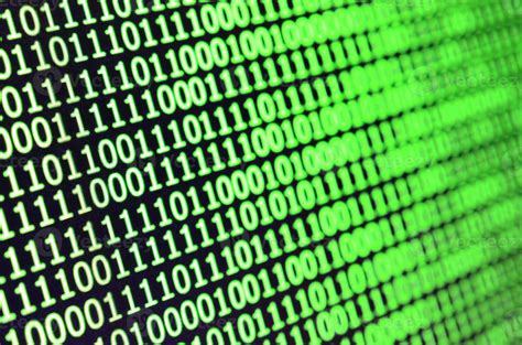 Macro Shot Of Binary Code On The Monitor Of An Office Computer The Concept Of The Programmer S