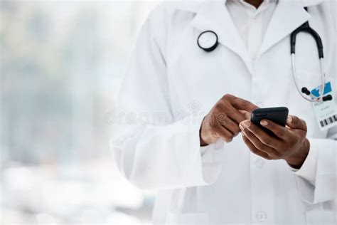 Phone Hand And Doctor Browsing Social Media Online Using Wifi In A