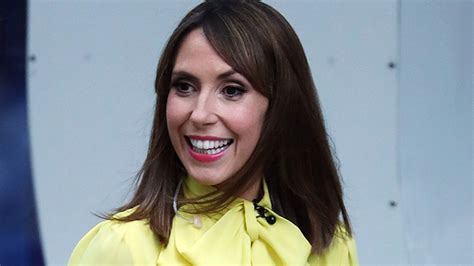Alex Jones Dazzles In Bold Ruffled Blouse And Fitted Trousers For