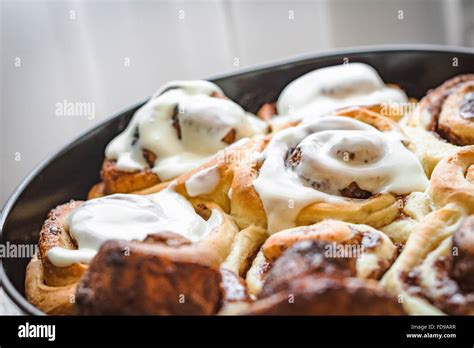 Homemade Cinnamon Buns Cinnabons With Cream Cheese Sauce In Round