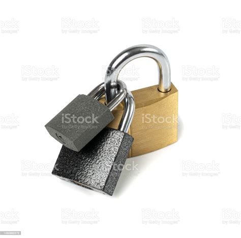Three Closed Locks Isolated Golden And Black Padlocks Locked Together